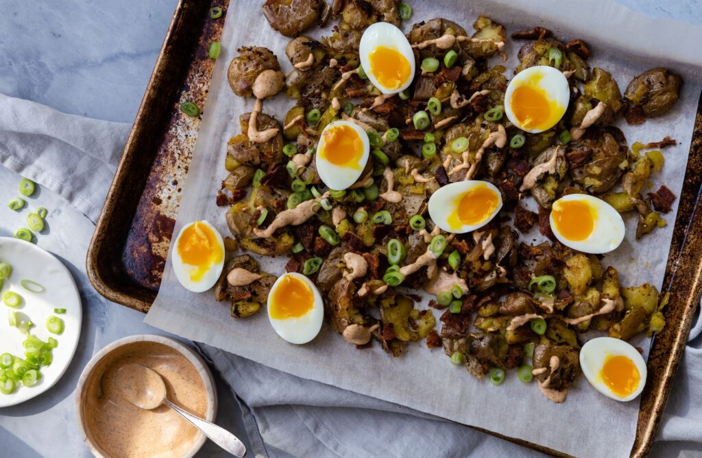 Smashed Potatoes with Bacon, Eggs and Spicy Aioli (Paleo)- Danielle Walker